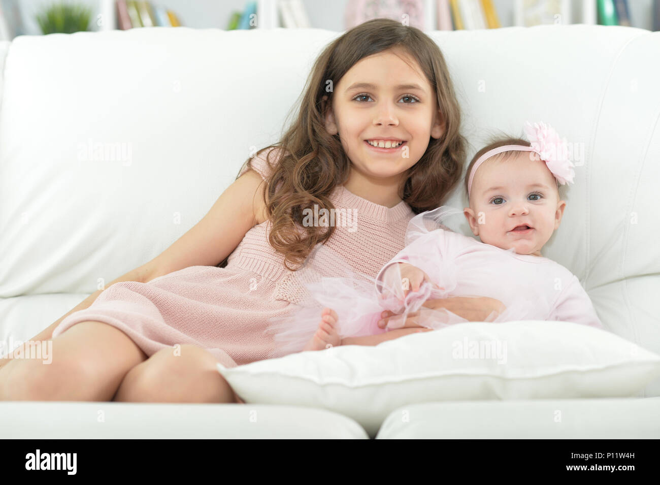two beautiful cute sisters Stock Photo - Alamy