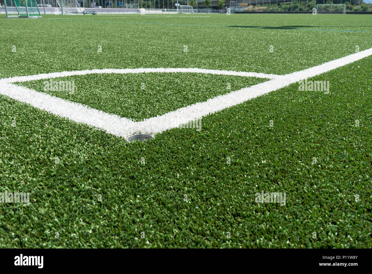 corner lines of football soccer field on plastic green Stock Photo - Alamy