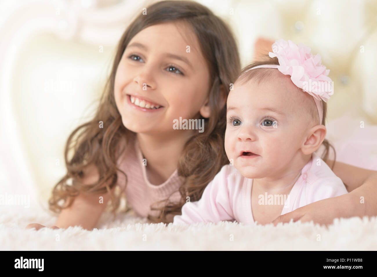 two sisters playing Stock Photo - Alamy