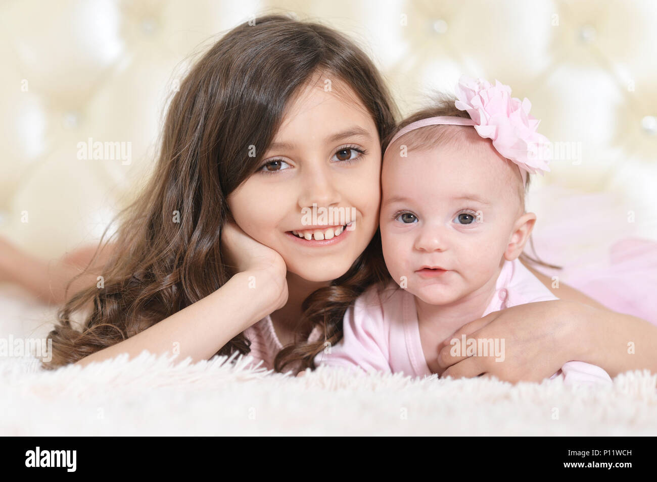 two beautiful cute sisters Stock Photo - Alamy
