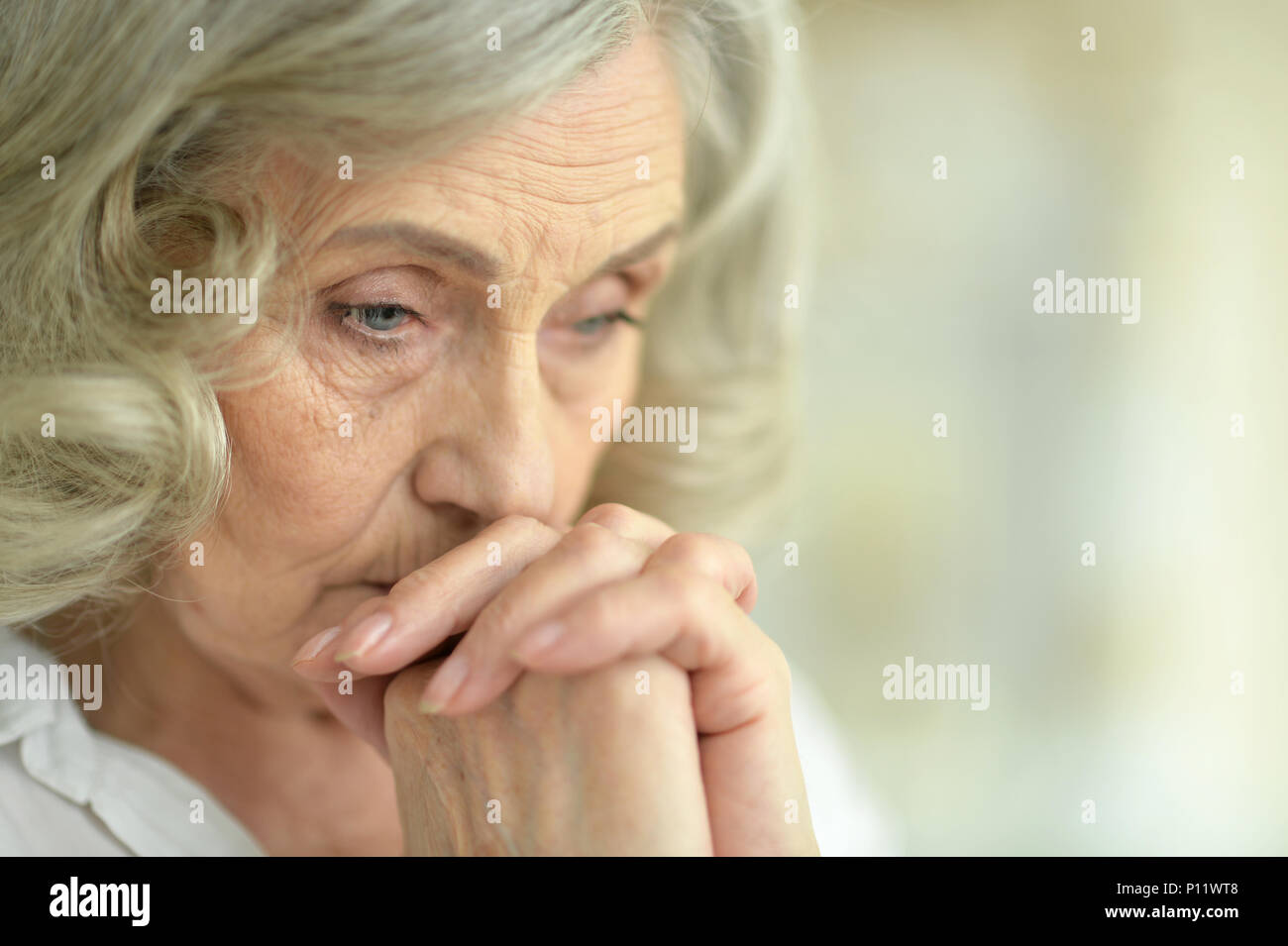 beautiful Sad senior woman Stock Photo - Alamy