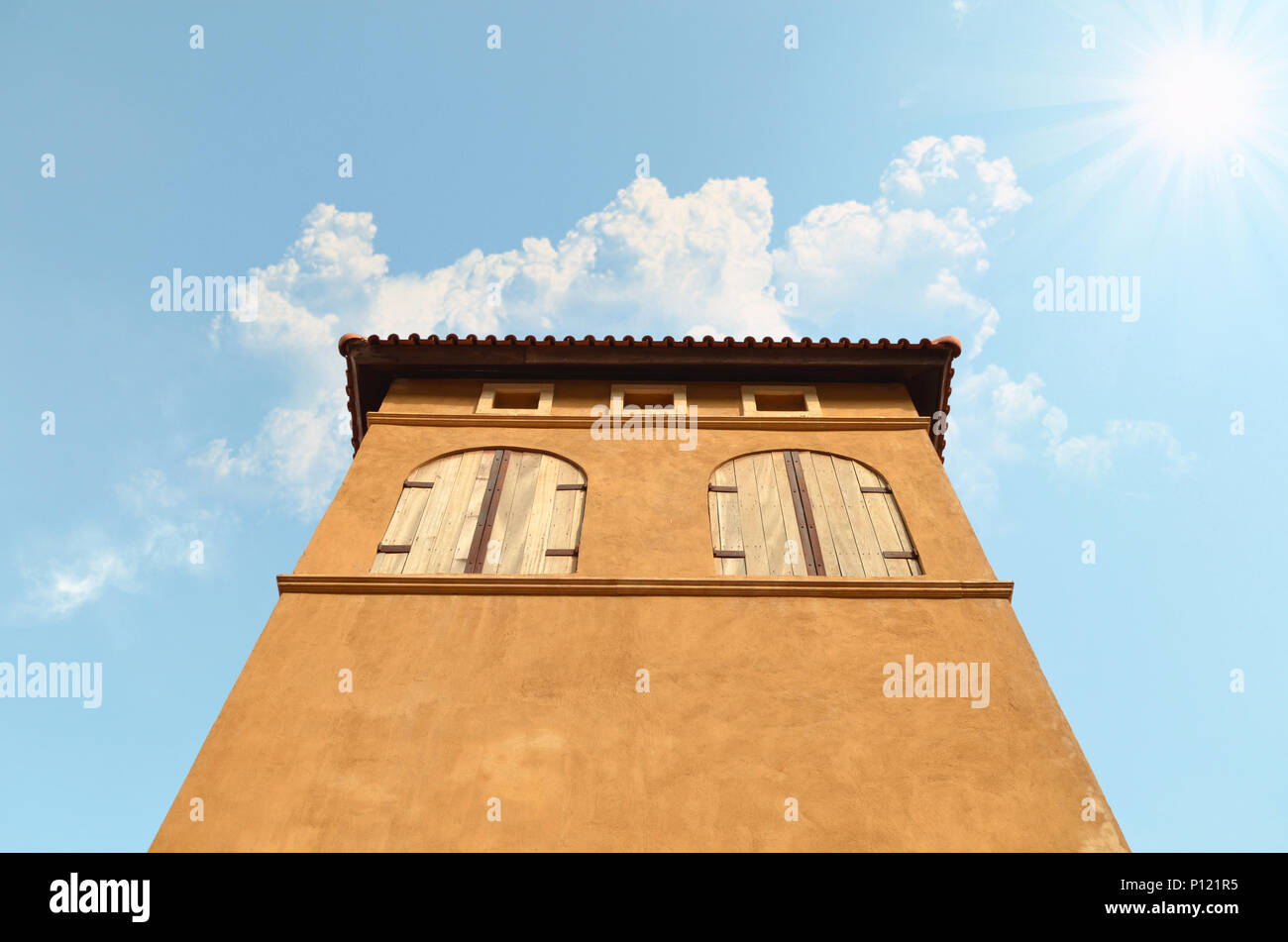 Italian style building with cloud blue sky Stock Photo - Alamy