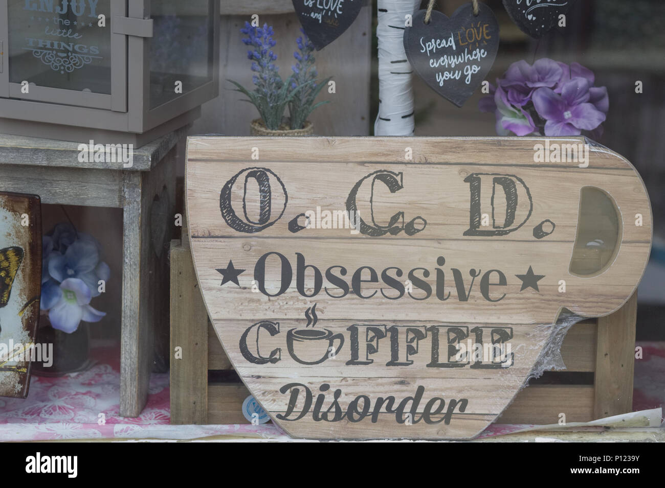O.C.D Obsessive coffee disorder, giant wooden cup in a shop window ...
