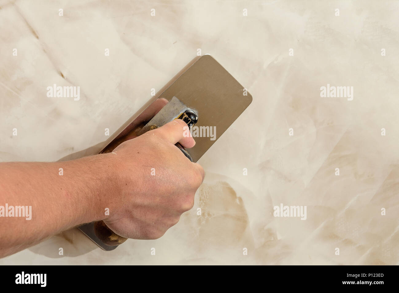 Masonry mason plastering polishing wall hi-res stock photography and ...