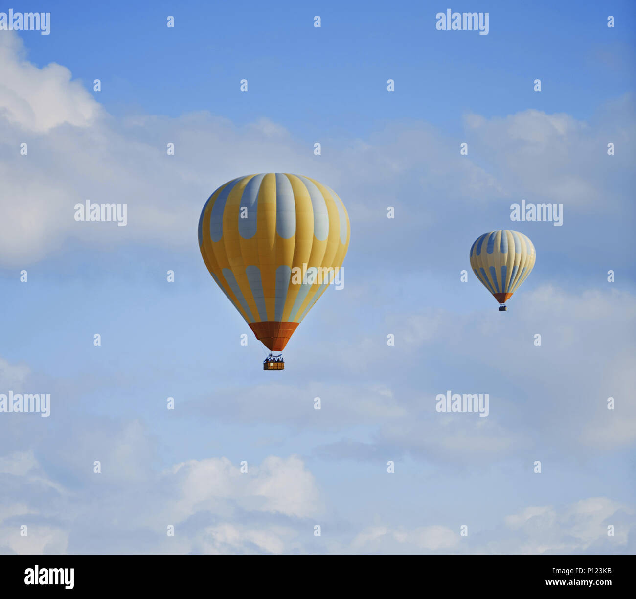 Two hot air balloons flying in the sky Stock Photo - Alamy