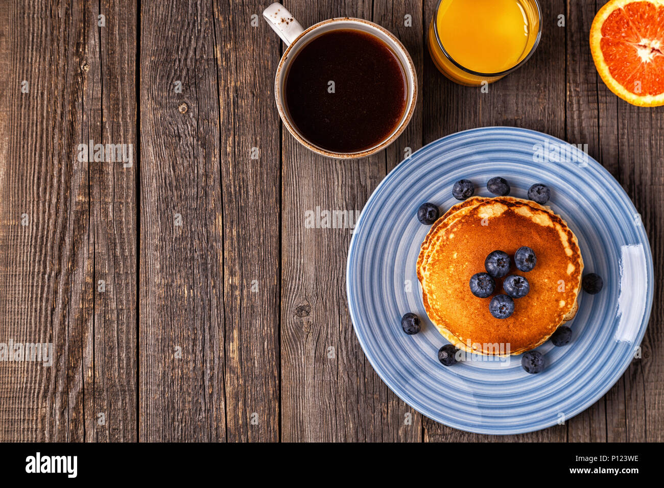 Delicious breakfast on a rustic table. Top view, copy space Stock Photo ...