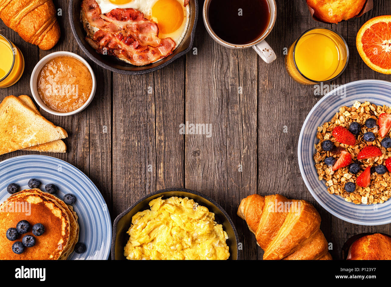 Delicious breakfast on a rustic table. Top view, copy space Stock Photo ...