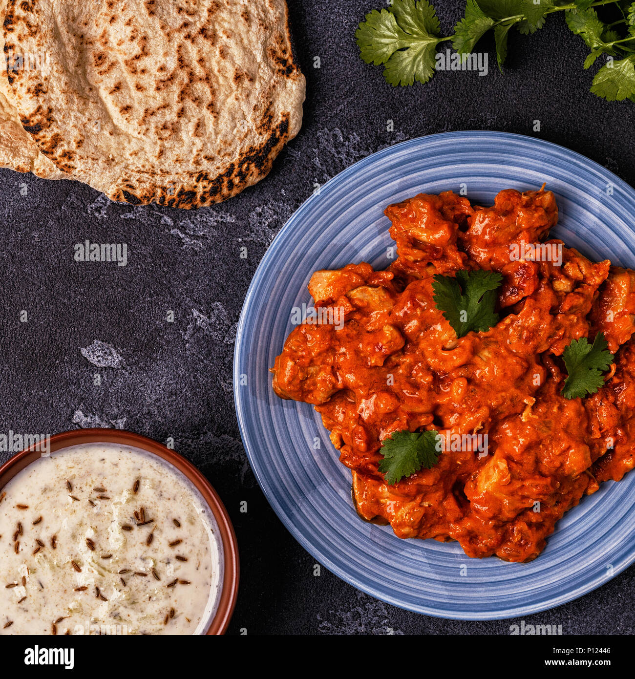 Indian chicken with raita hi-res stock photography and images - Alamy