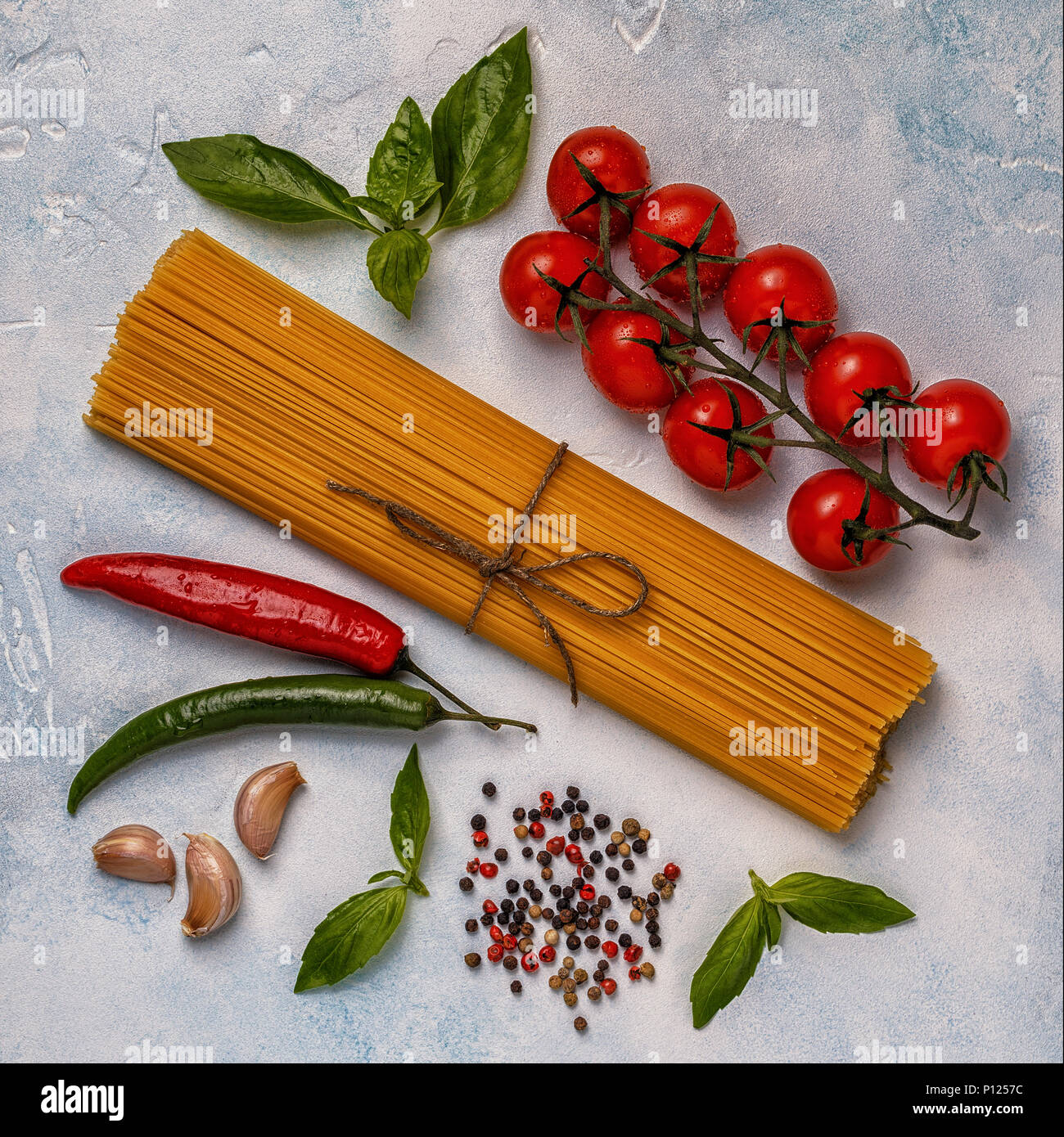 Italian food background with pasta, spices and vegetables. Top view ...