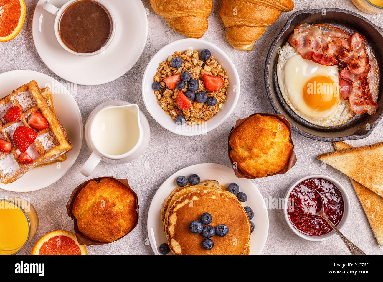 Delicious breakfast on a light table. Top view, copy space Stock Photo ...