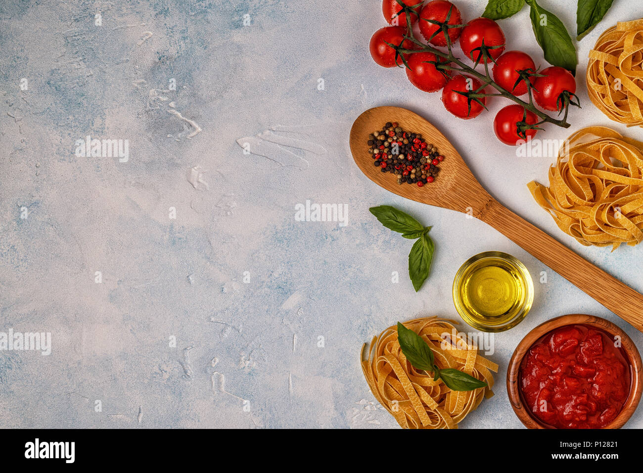 Italian food background with pasta, spices and vegetables. Top view ...