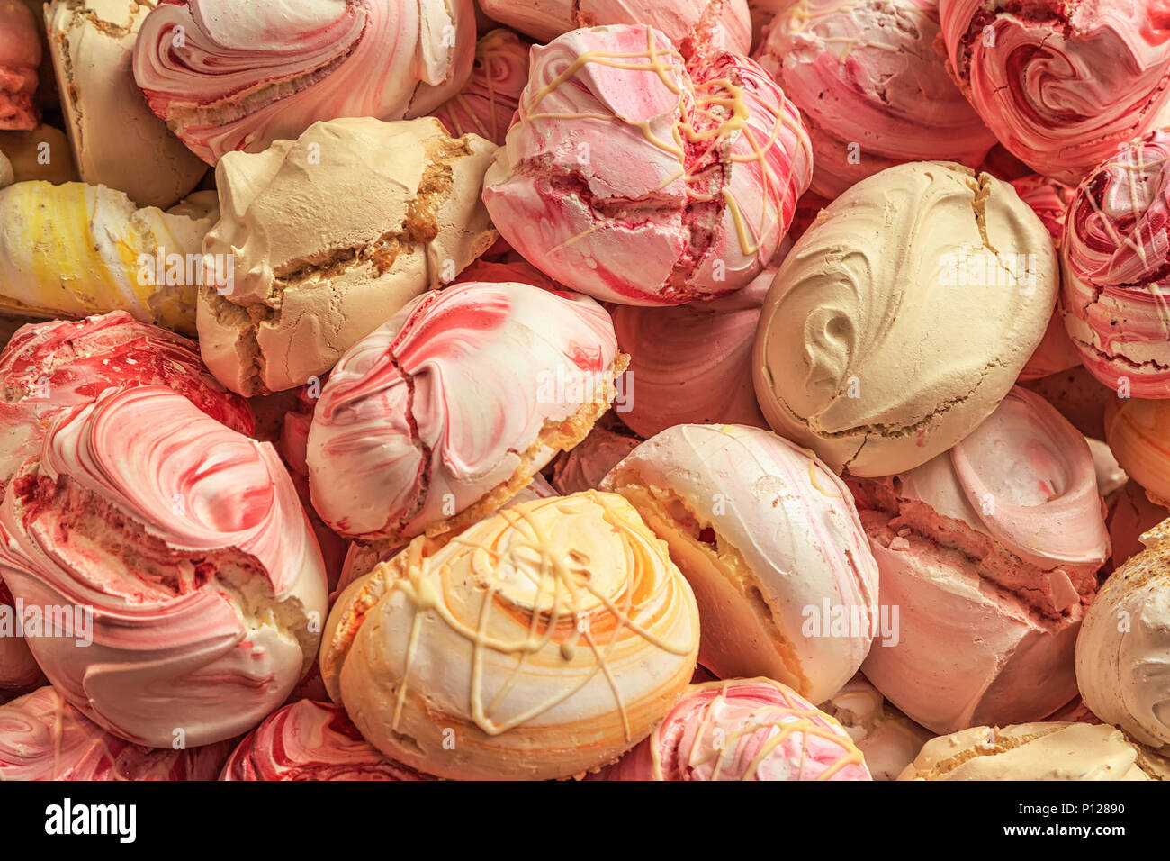 Showcase with meringues in the store Stock Photo - Alamy