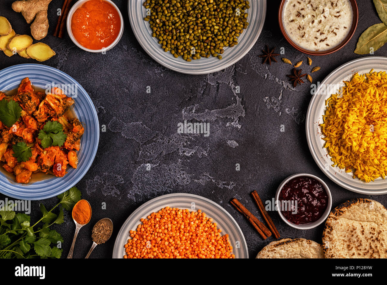 Traditional Indian curry with rice, lentils and mung beans. Top view ...