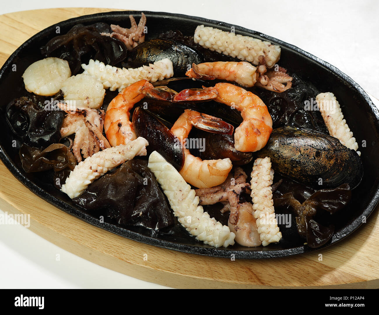 Pan-Asian style seafood - lightly roasted tiger prawns, mini octopuses ...