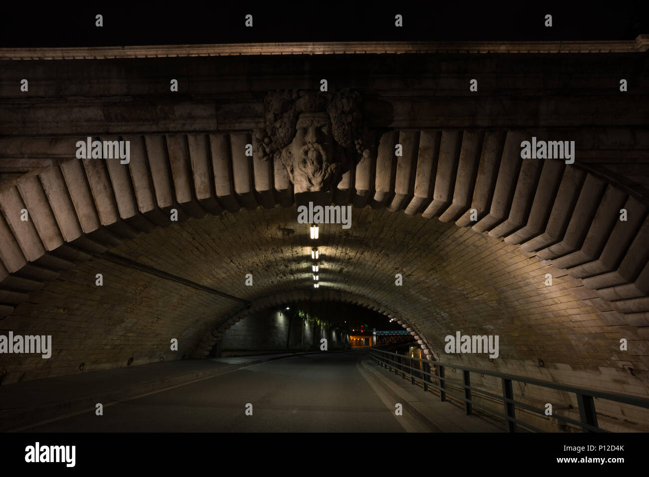 A night view of Pont Notre-Dame with Dionysus above the pedestrian ...