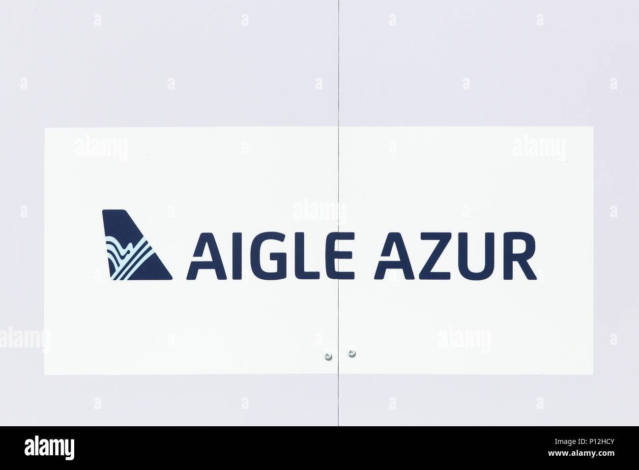 Lyon, France - May 27, 2017: Aigle Azur logo on a wall. Aigle Azur is a ...