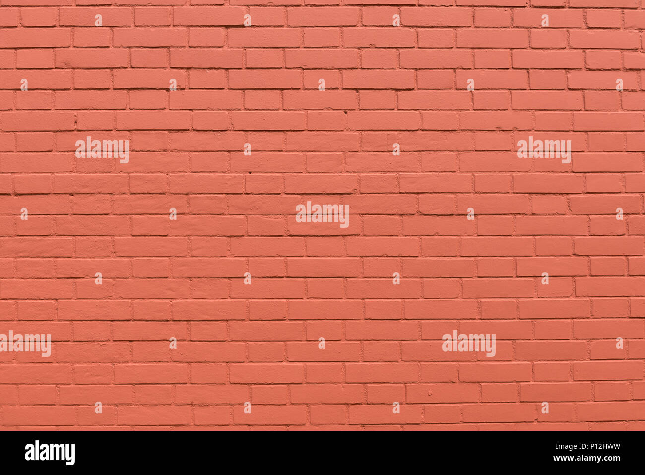 Strong red vertical brick wall background, surface. Red, orange tiles ...