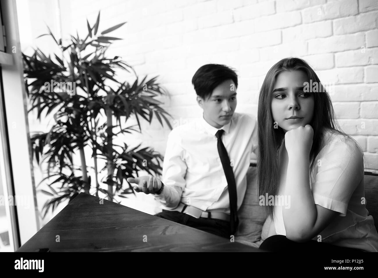 Two people talking cafe Black and White Stock Photos & Images - Alamy