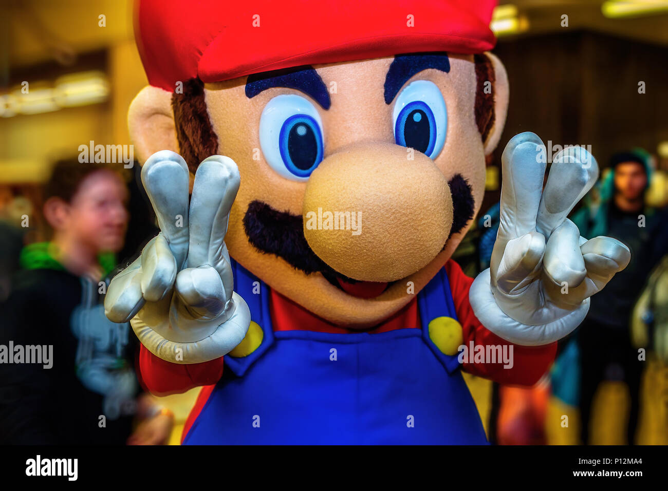 mario bros action figure costume at cosplay festival Stock Photo - Alamy
