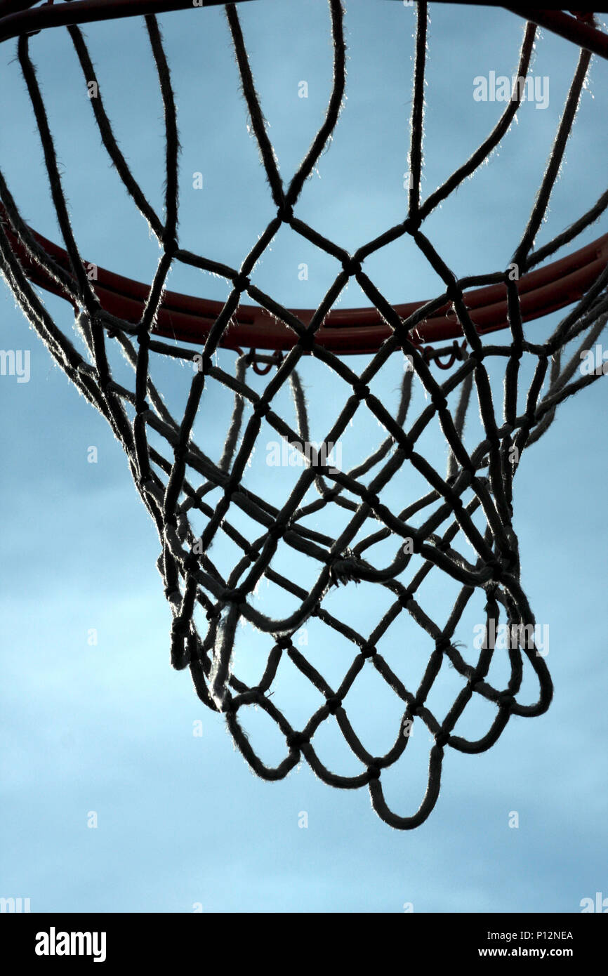 Basketball hoop on blue sky background Stock Photo - Alamy