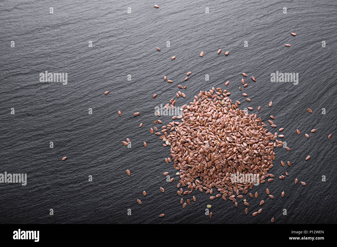 Black flax seeds linum hi-res stock photography and images - Alamy