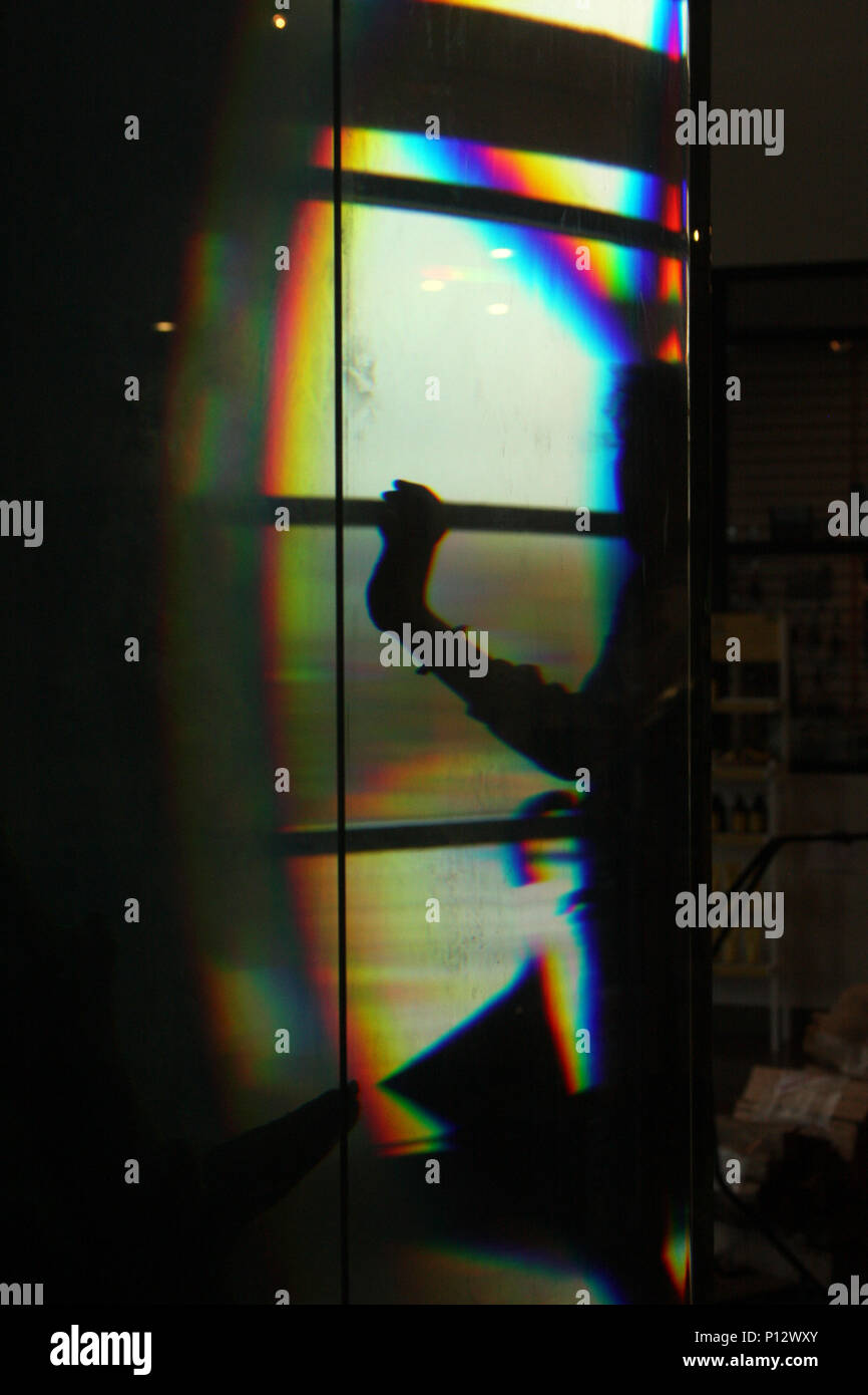 Multicolored reflections on glass surface Stock Photo - Alamy