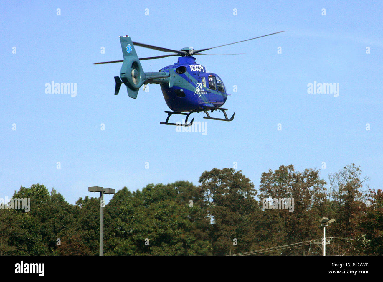 Helicopter in flight Stock Photo - Alamy