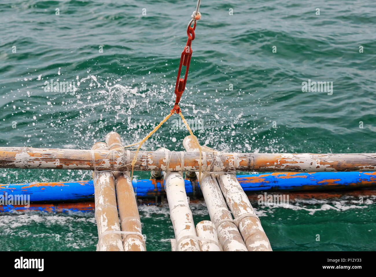 Outrigger projecting from a Filipino bangka boat serving as a lateral ...