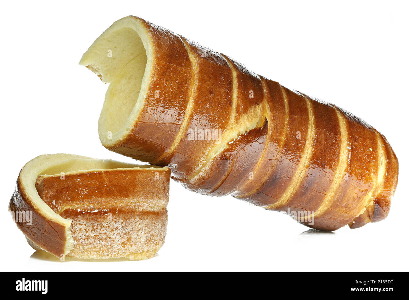 Baumstriezel (spit cake) isolated on white background Stock Photo - Alamy