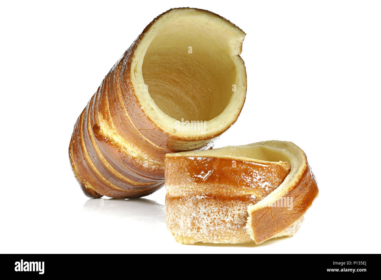 Baumstriezel (spit cake) isolated on white background Stock Photo - Alamy