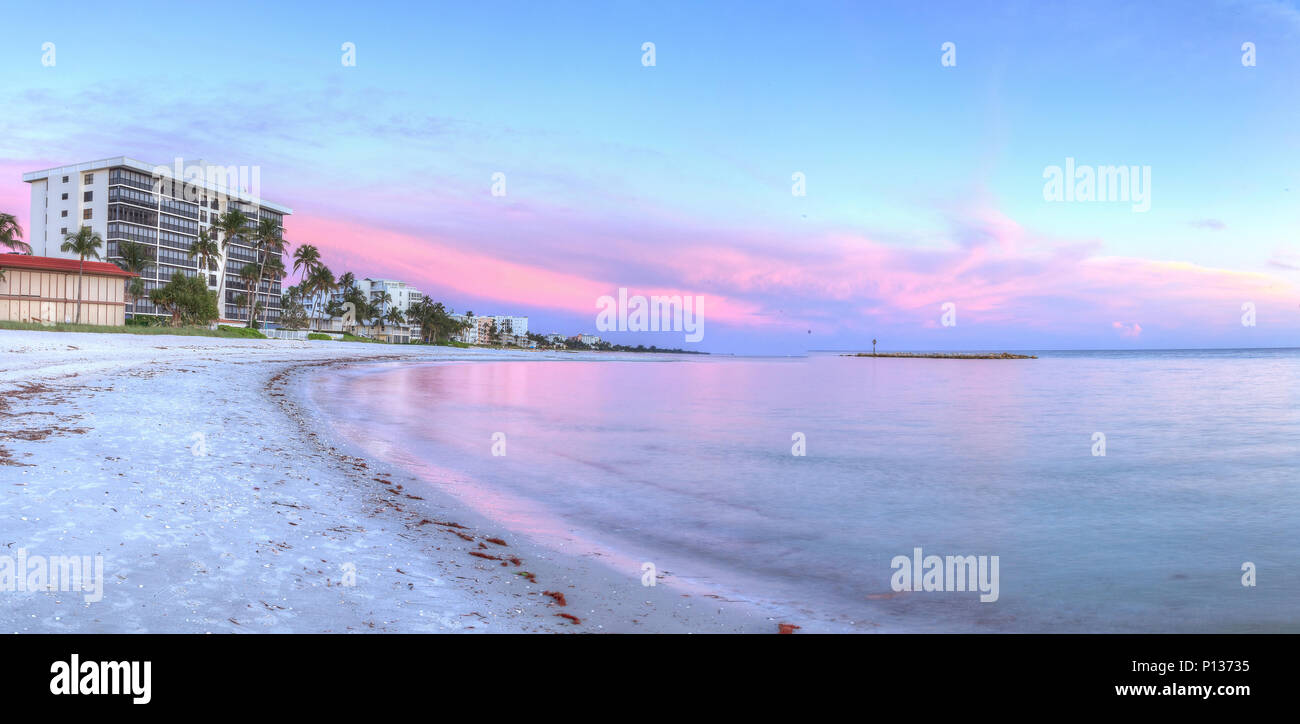 Lowdermilk Beach sunset over powder white sand in Naples, Florida Stock ...