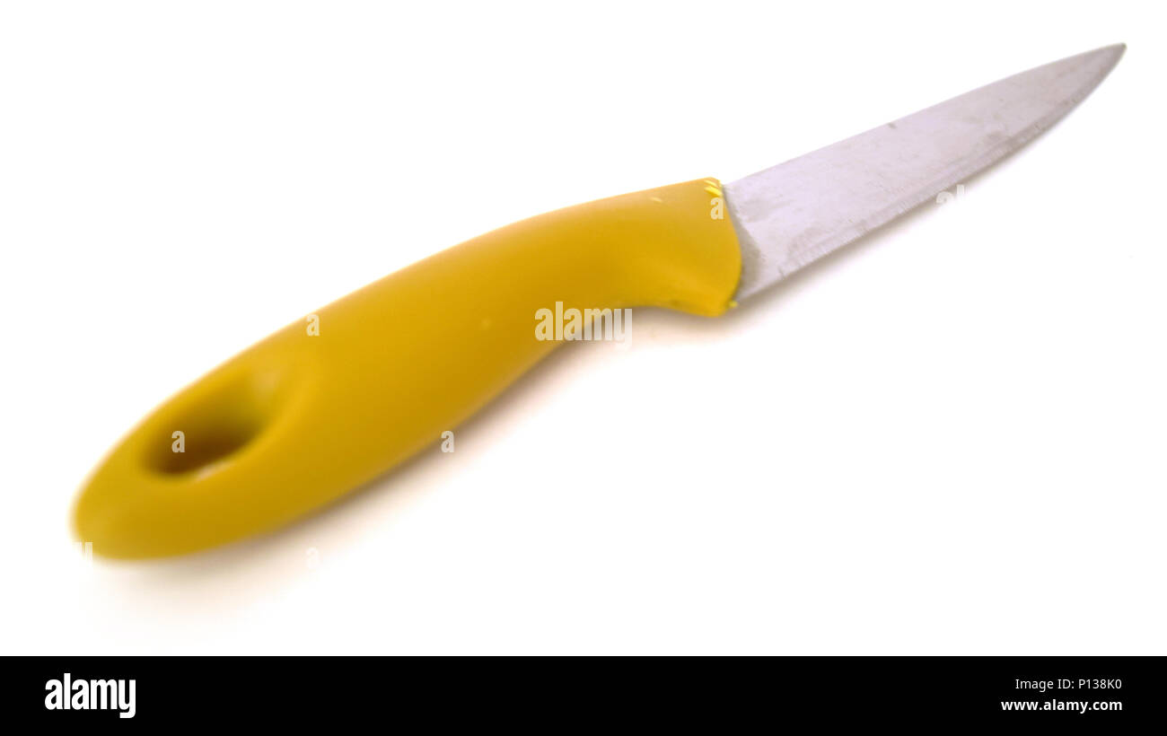 Plastic serrated kitchen knife with yellow handle - isolated Stock ...