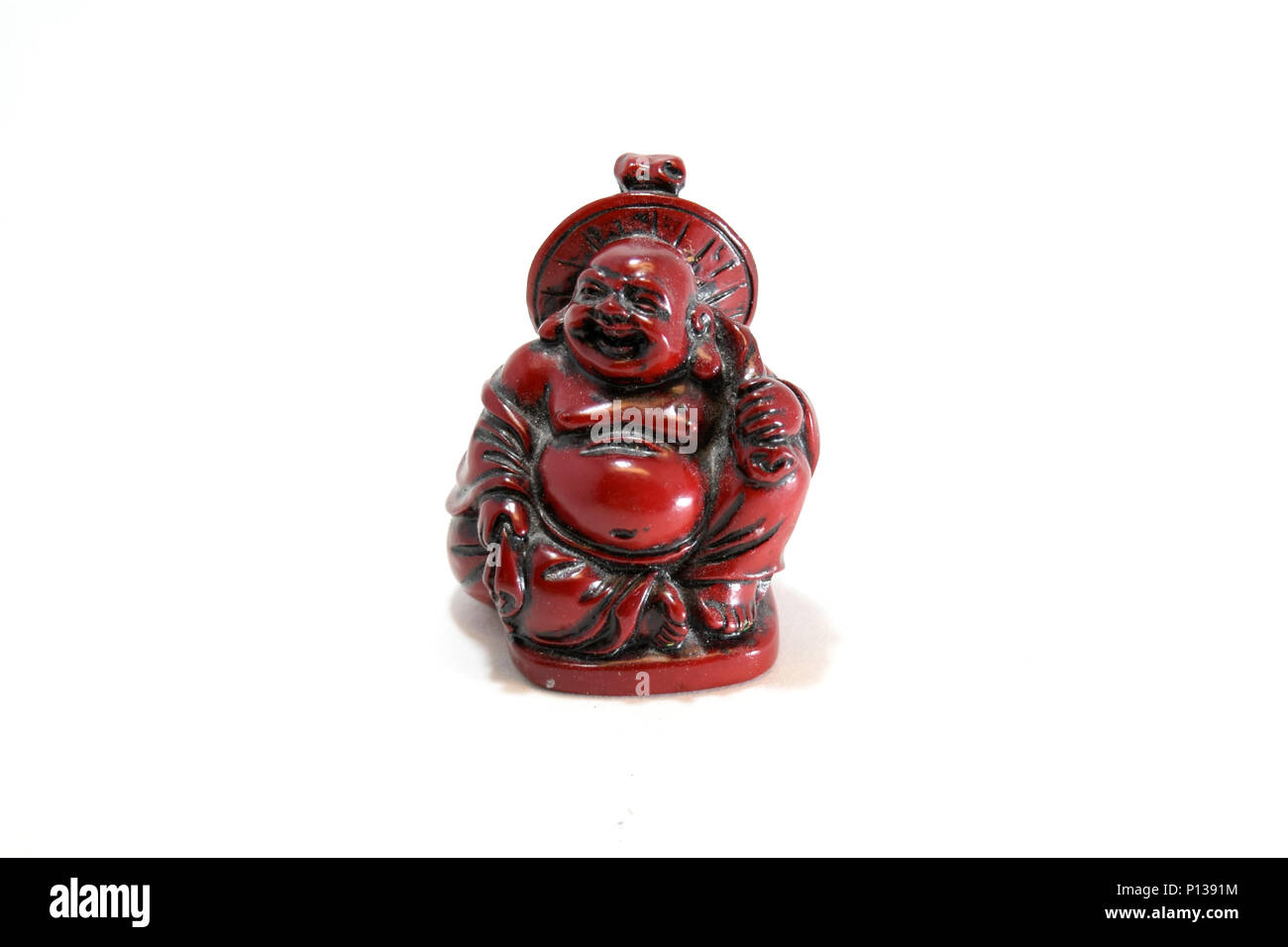 Happy wooden red buddha figurine, isolated Stock Photo - Alamy