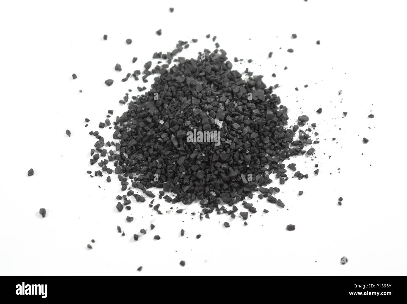 Black volcanic salt from Hawaii - isolated, studio shot Stock Photo - Alamy