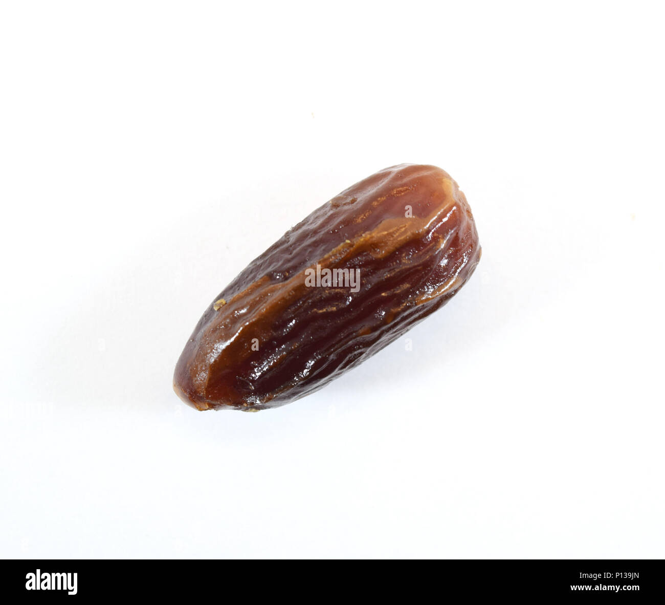 Sweet dried date fruit - isolated Stock Photo - Alamy