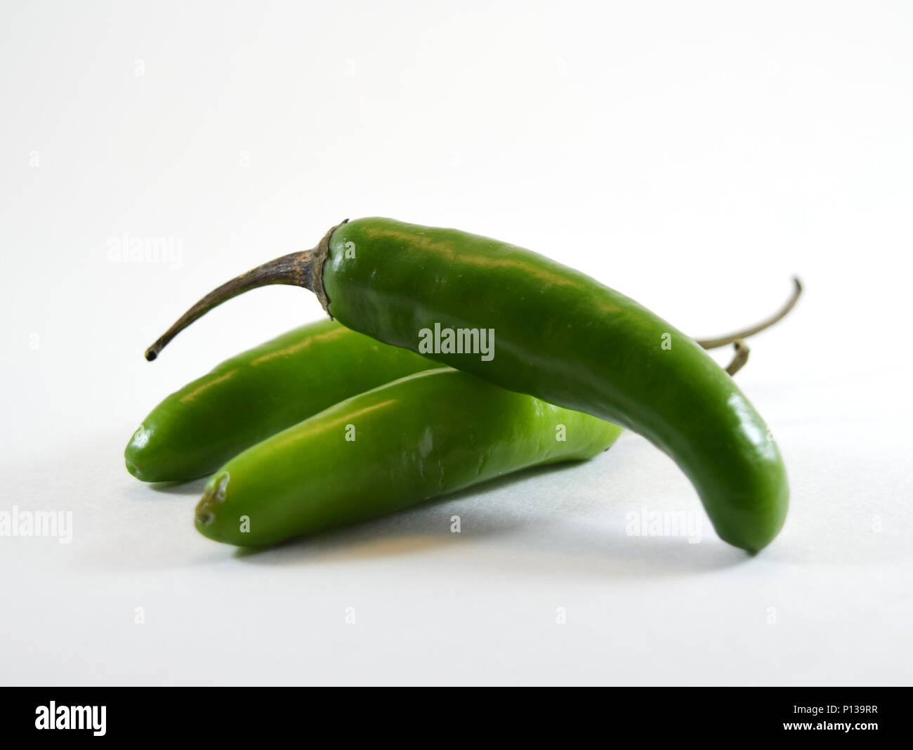 Spicy green serrano pepper (capsicum anuum) - isolated Stock Photo - Alamy