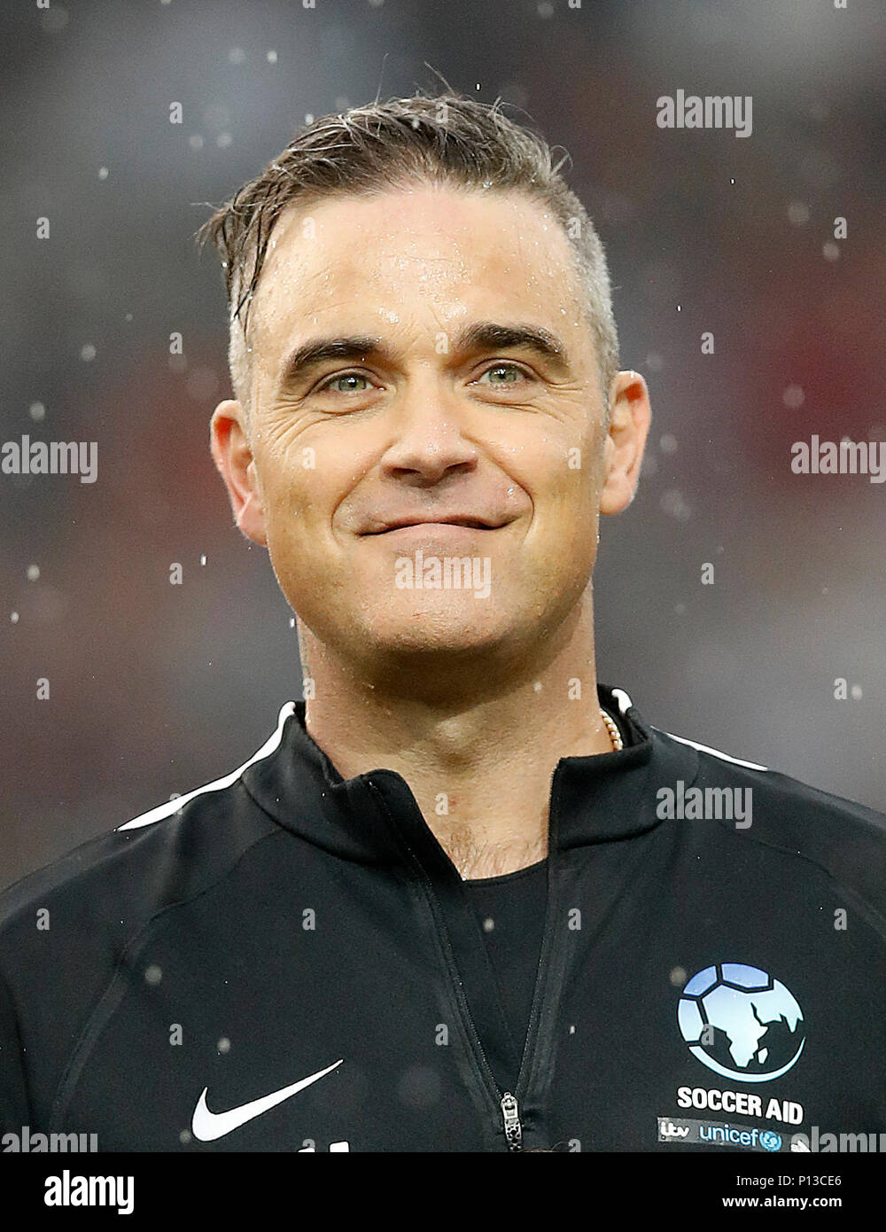 England's Robbie Williams during the UNICEF Soccer Aid match at Old ...