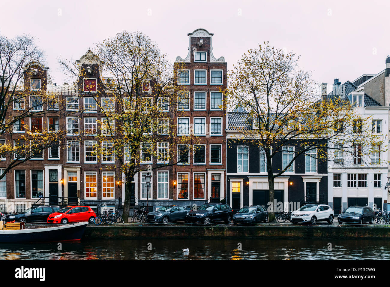 Architecture Of Dutch Houses Facade and Houseboats On Amsterdam Canal ...