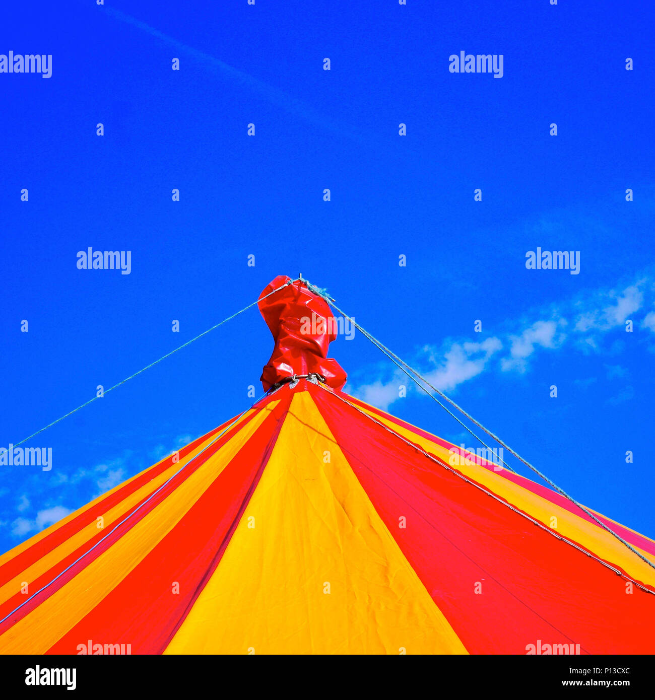 Blue and yellow circus tent hi-res stock photography and images - Alamy