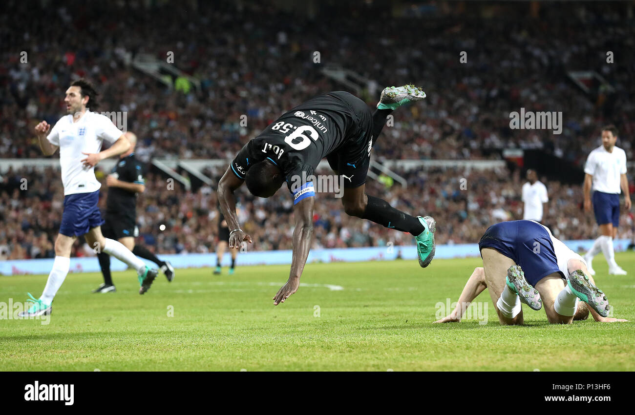 World XI's Usain Bolt falls to the floor during the UNICEF Soccer Aid ...