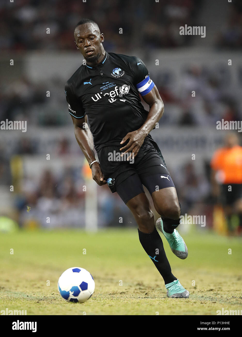 World XI's Usain Bolt during the UNICEF Soccer Aid match at Old ...