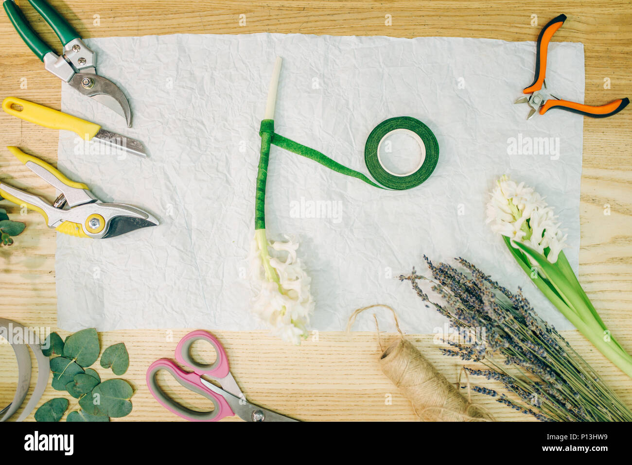 Florist workplace with decoration tools, top view, nobody. Flower shop ...