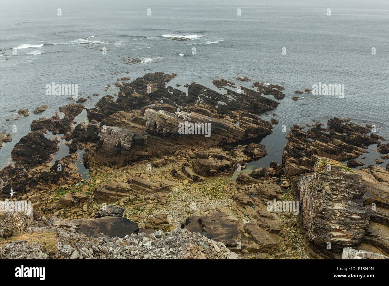 Summer Atlantic rocky coast view Big stony rockfall on precipice shore ...