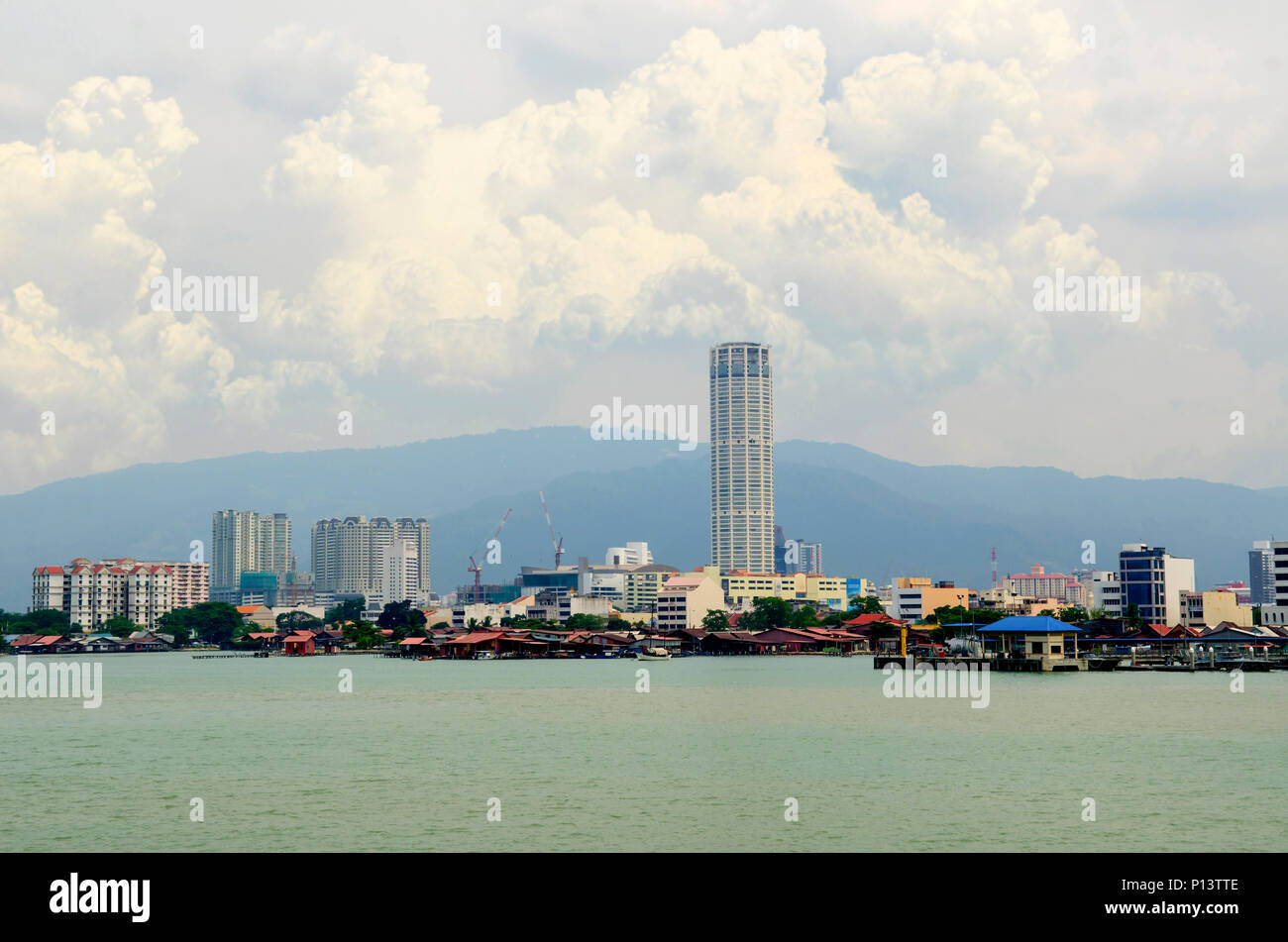 Penang cityscape with boats on ocean and skyscraper in Malaysia, Asia ...