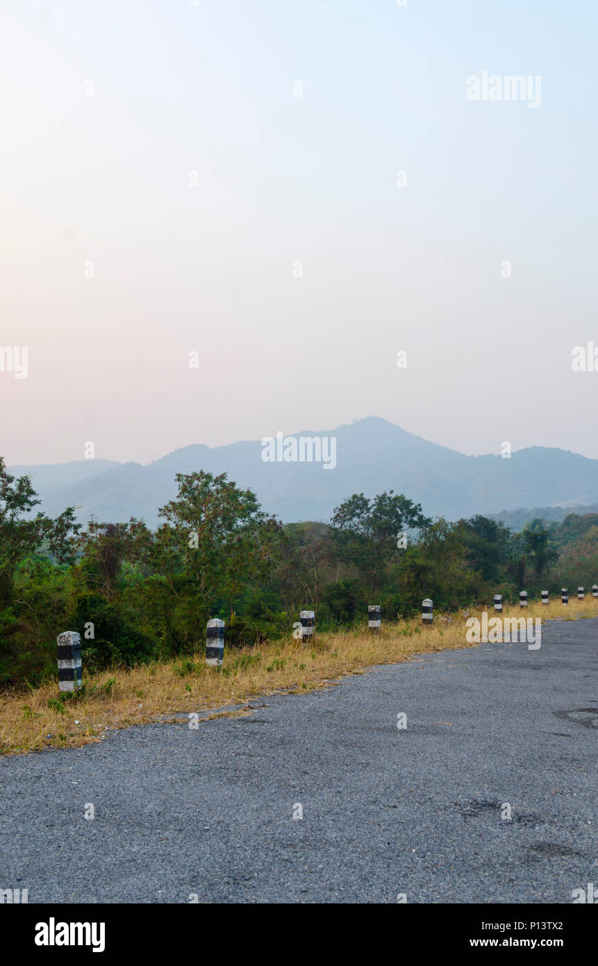 roadside pillar in the surface of natural road Stock Photo - Alamy