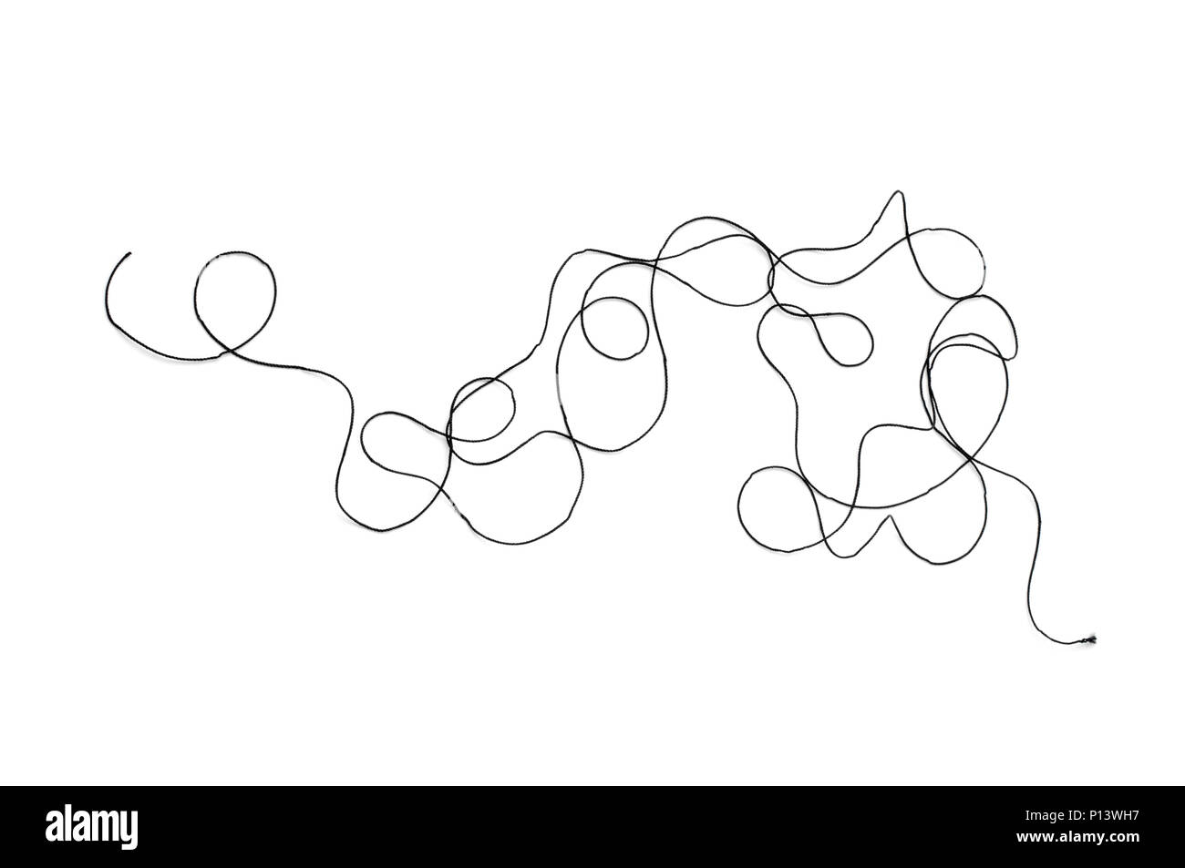 Tangled black thread isolated on white background Stock Photo - Alamy