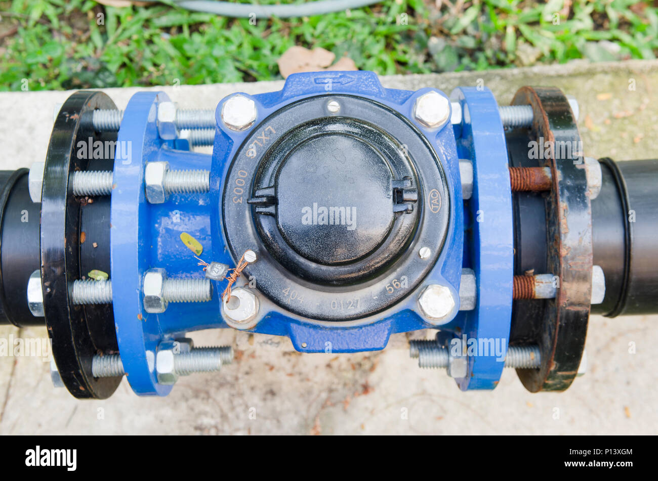 Valve of water pumping Stock Photo - Alamy