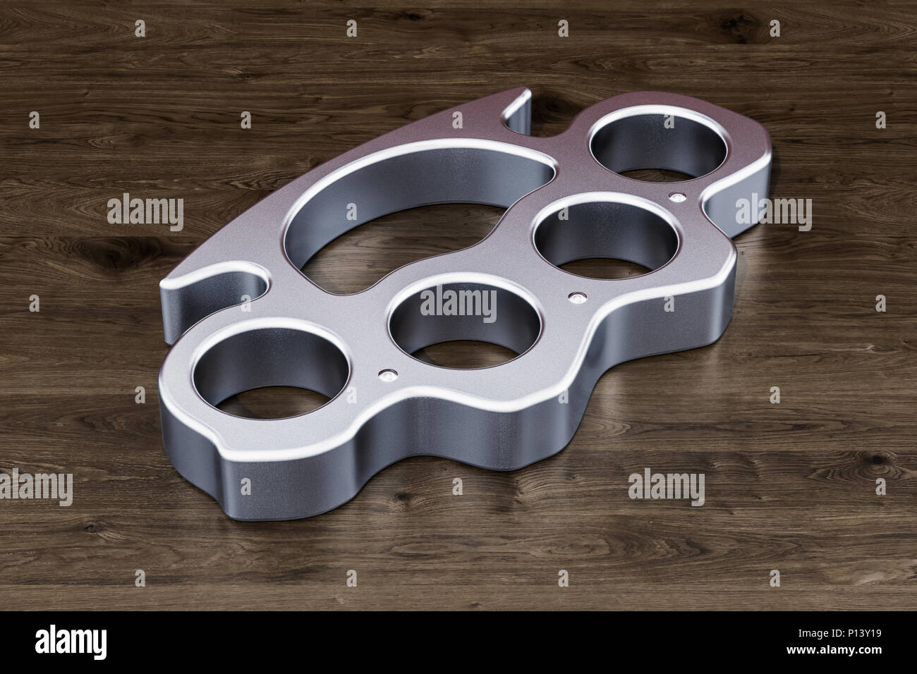 Brass knuckles on the wooden table, 3D rendering Stock Photo - Alamy