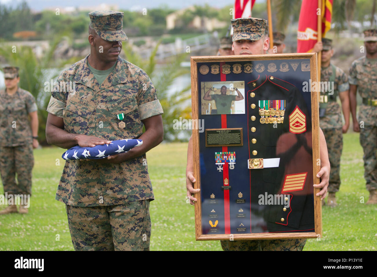U.S. Marine Corps Gunnery Sgt. John W. Jelks Jr, left, a Marine Liaison ...