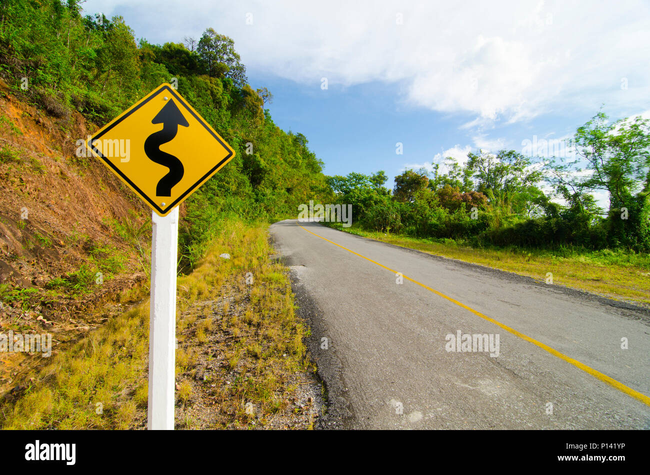 Paved road the S-shape in natural areas Stock Photo - Alamy